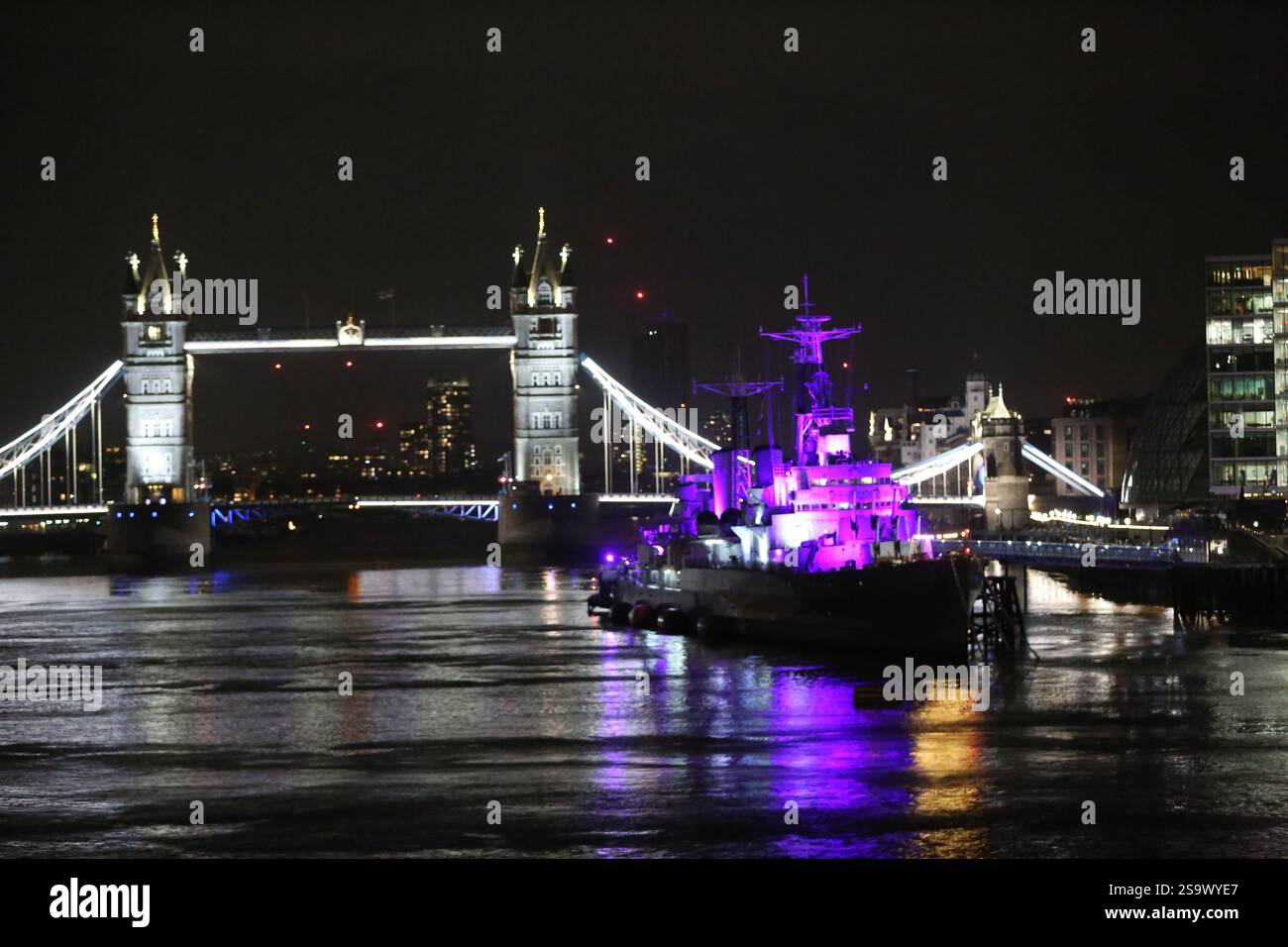 London, UK. 27 January 2025. HMS Belfast was illuminated in purple to ...