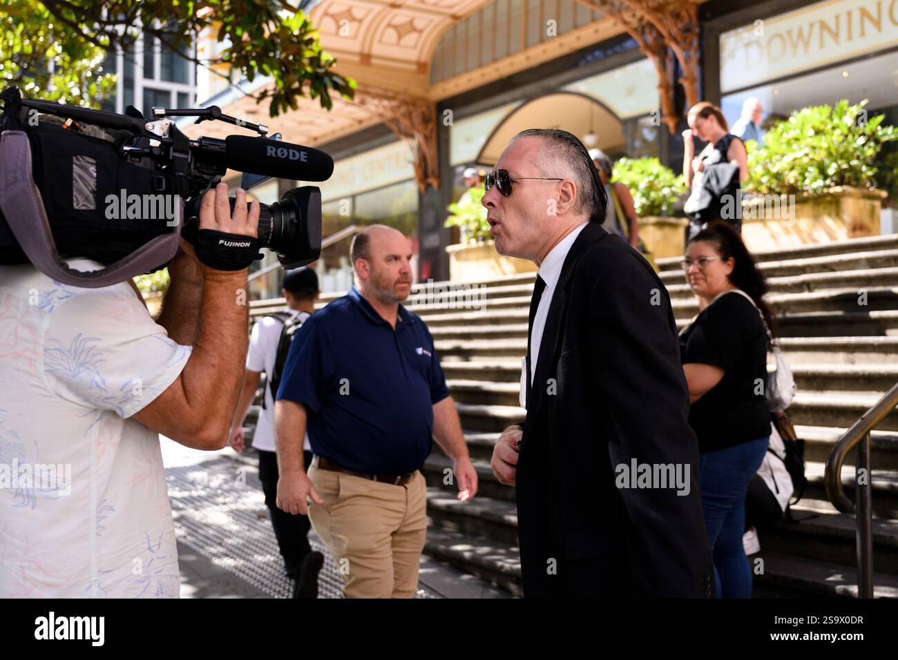 David Ancans walks out of the Downing Centre Local Court in Sydney ...