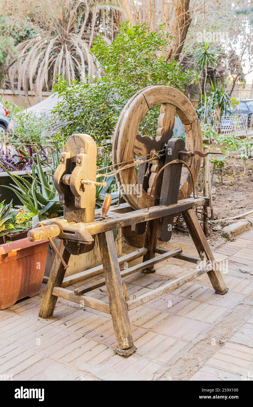 Old Cairo, Cairo, Egypt. An antique wooden spinning wheel Stock Photo ...