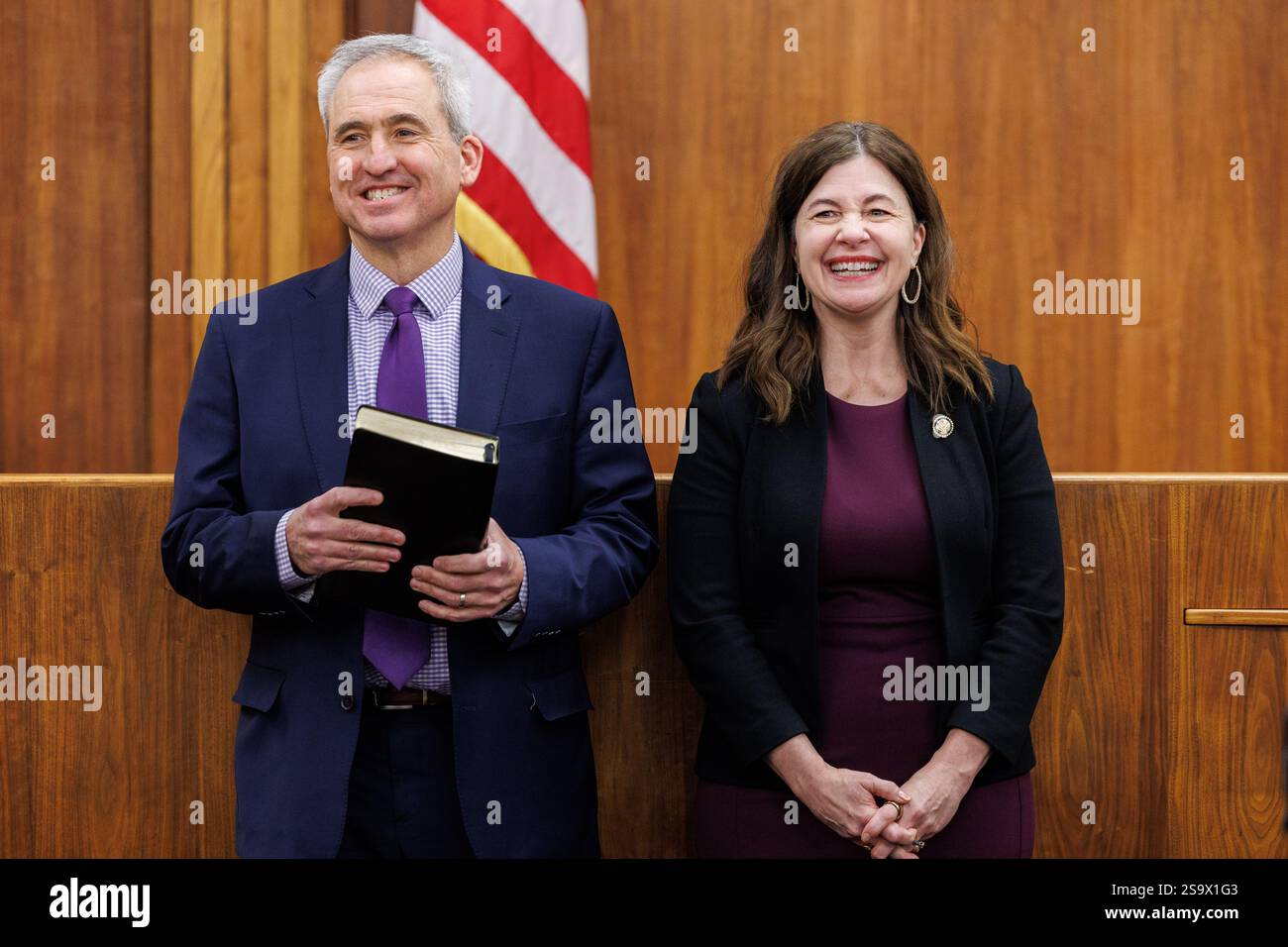 Bay City Commissioner Joseph Rivet, left, and U.S. Rep. Kristen ...