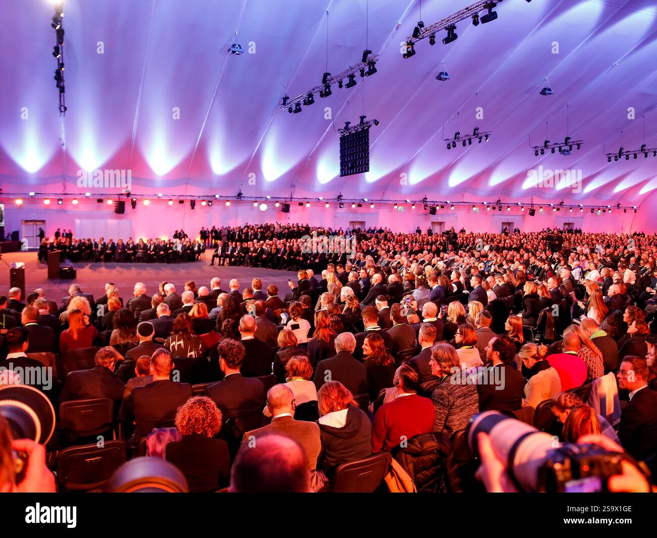 Guests attend a celebration by a symbolic Nazi transport wagon in ...