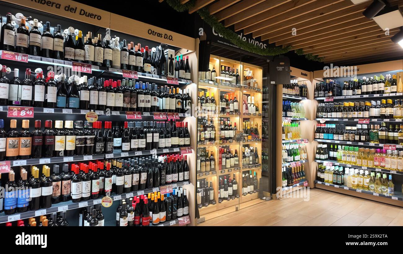 The wine and alcohol section of a supermarket in Spain Stock Photo - Alamy