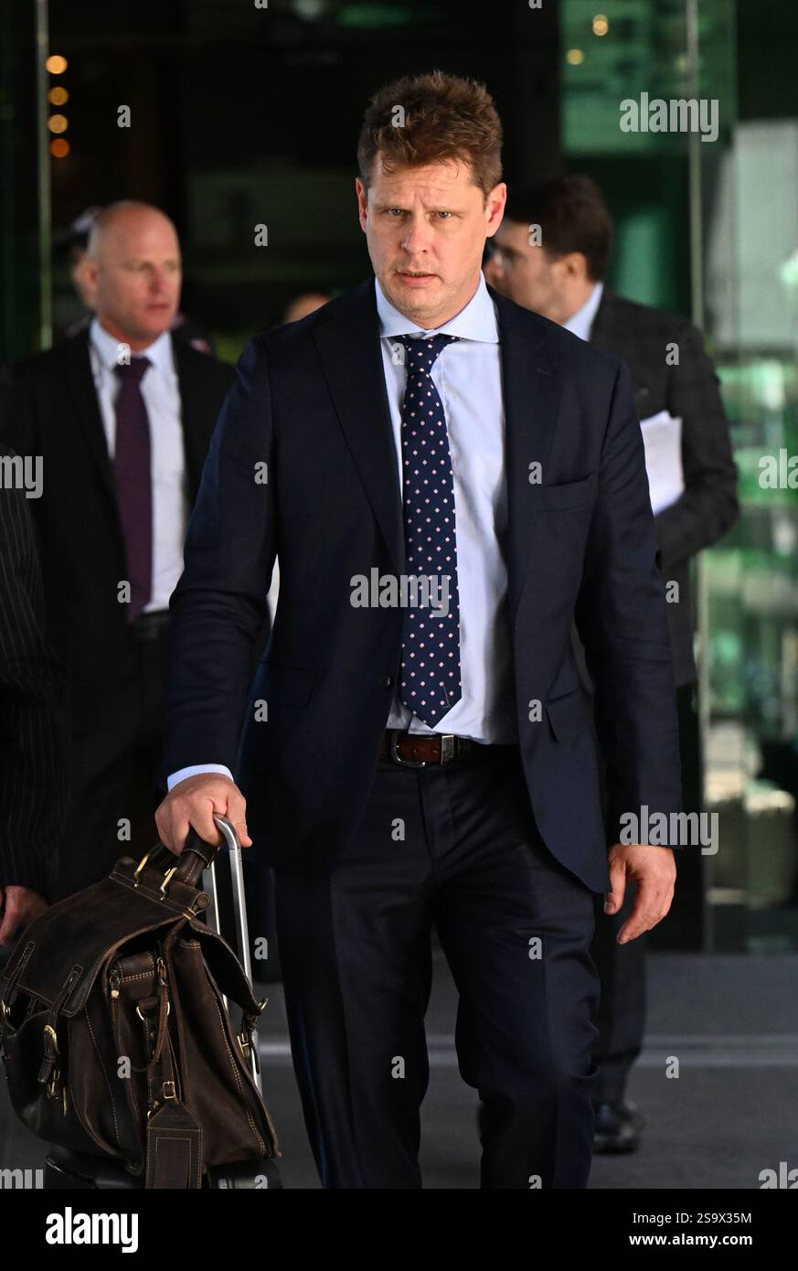 Lawyer, Mathew Cuskelly is seen leaving the Brisbane Magistrates Court ...