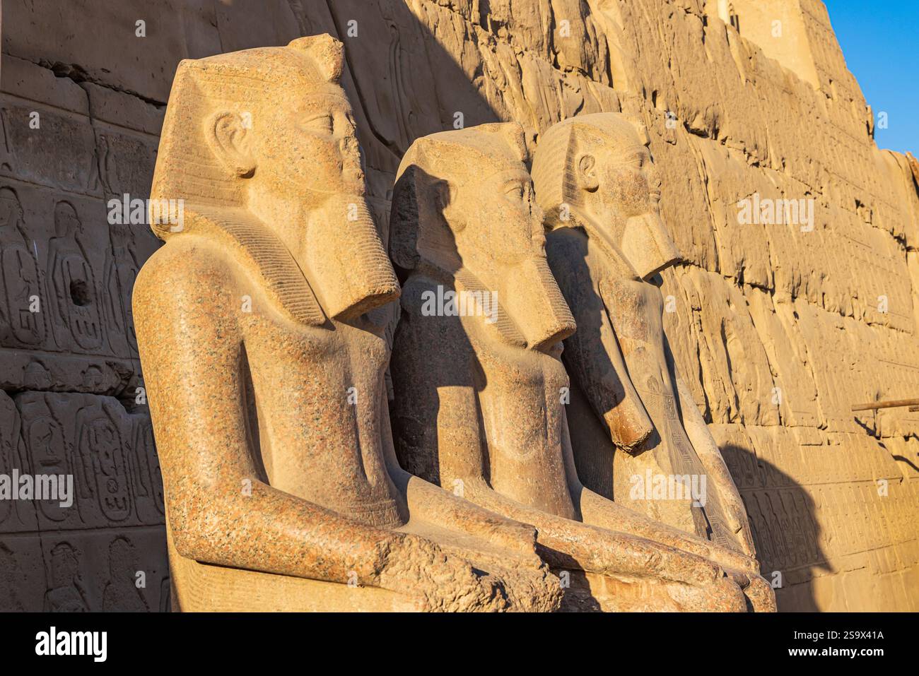 Karnak, Luxor, Egypt. Seated statues at the Karnak Temple Complex Stock ...