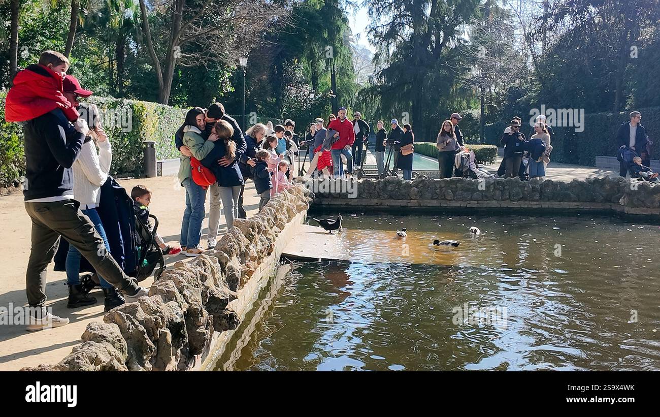 tourists inside Parque de María Luisa, a prominent park in Seville ...