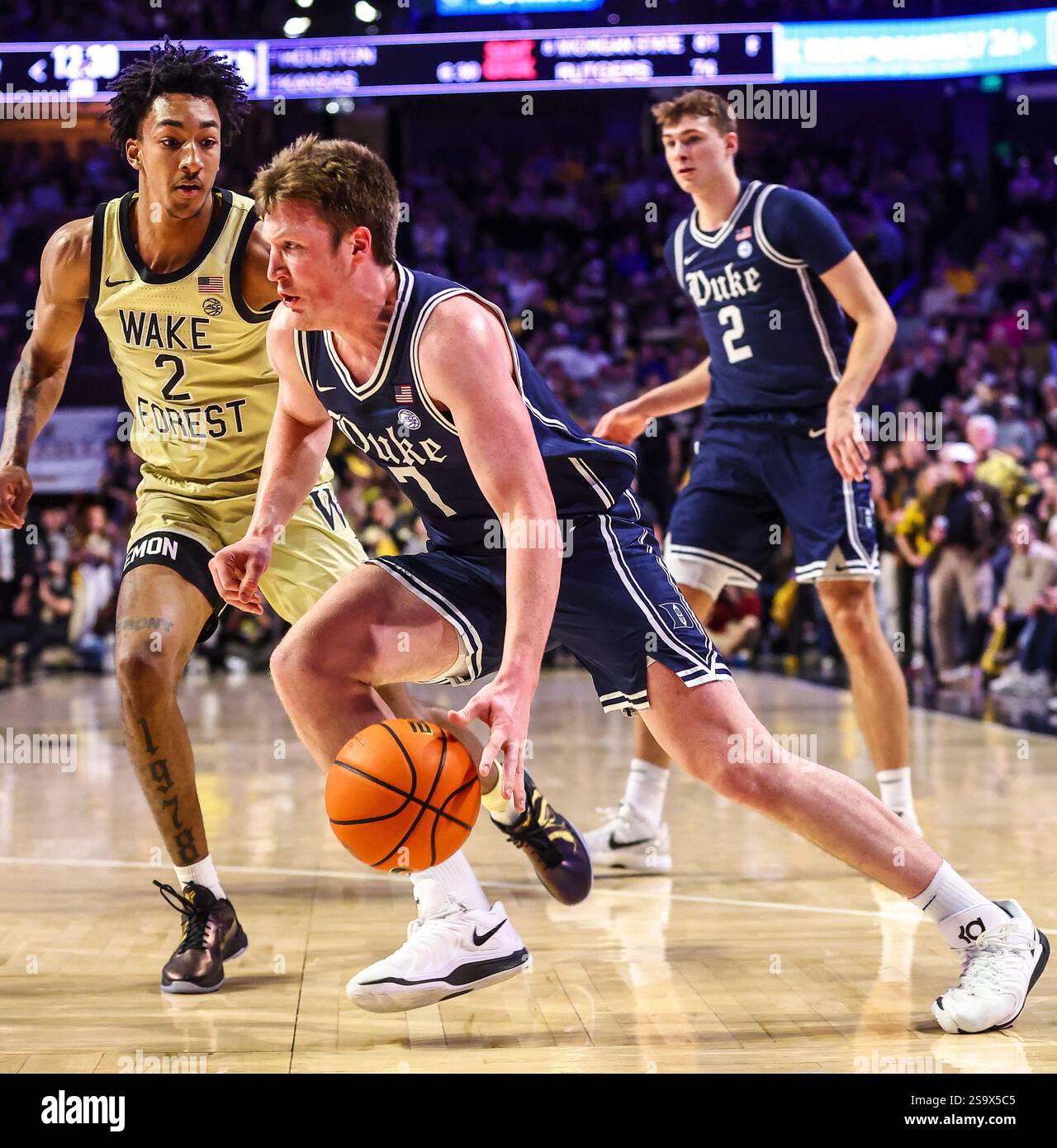January 25, 2024: Duke forward Kon Knueppel (7) drives to basket in ...