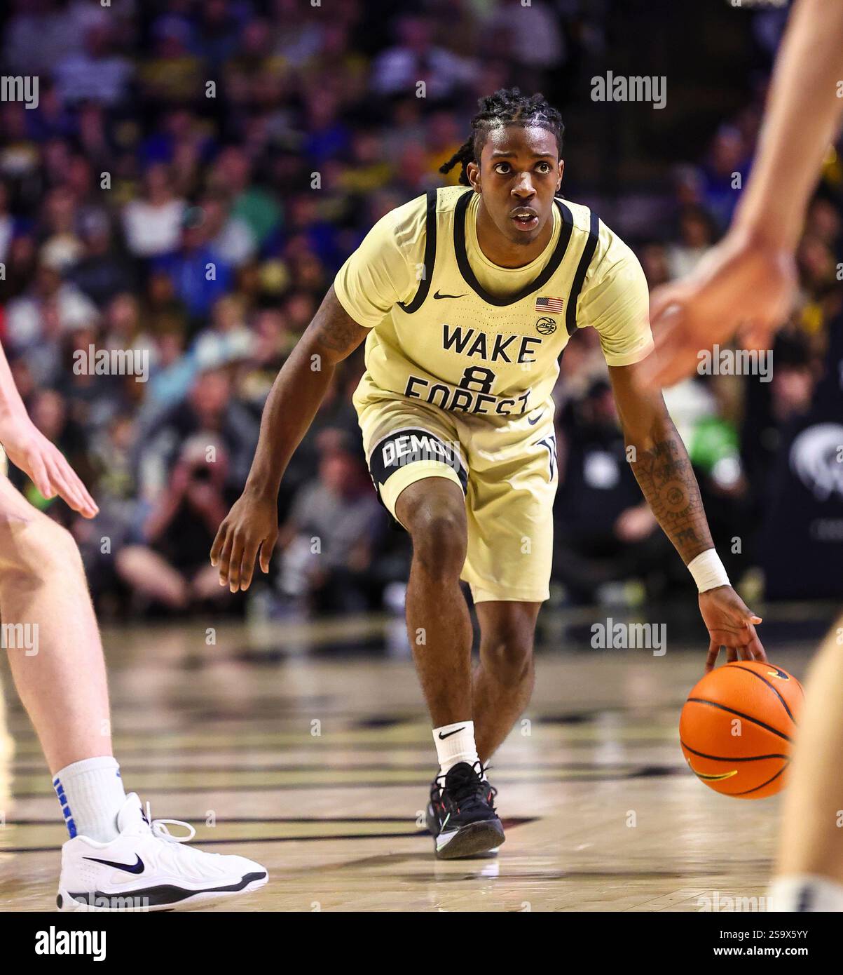 January 25, 2024: Wake Forest guard Ty-Laur Johnson (8) dribbles ball ...