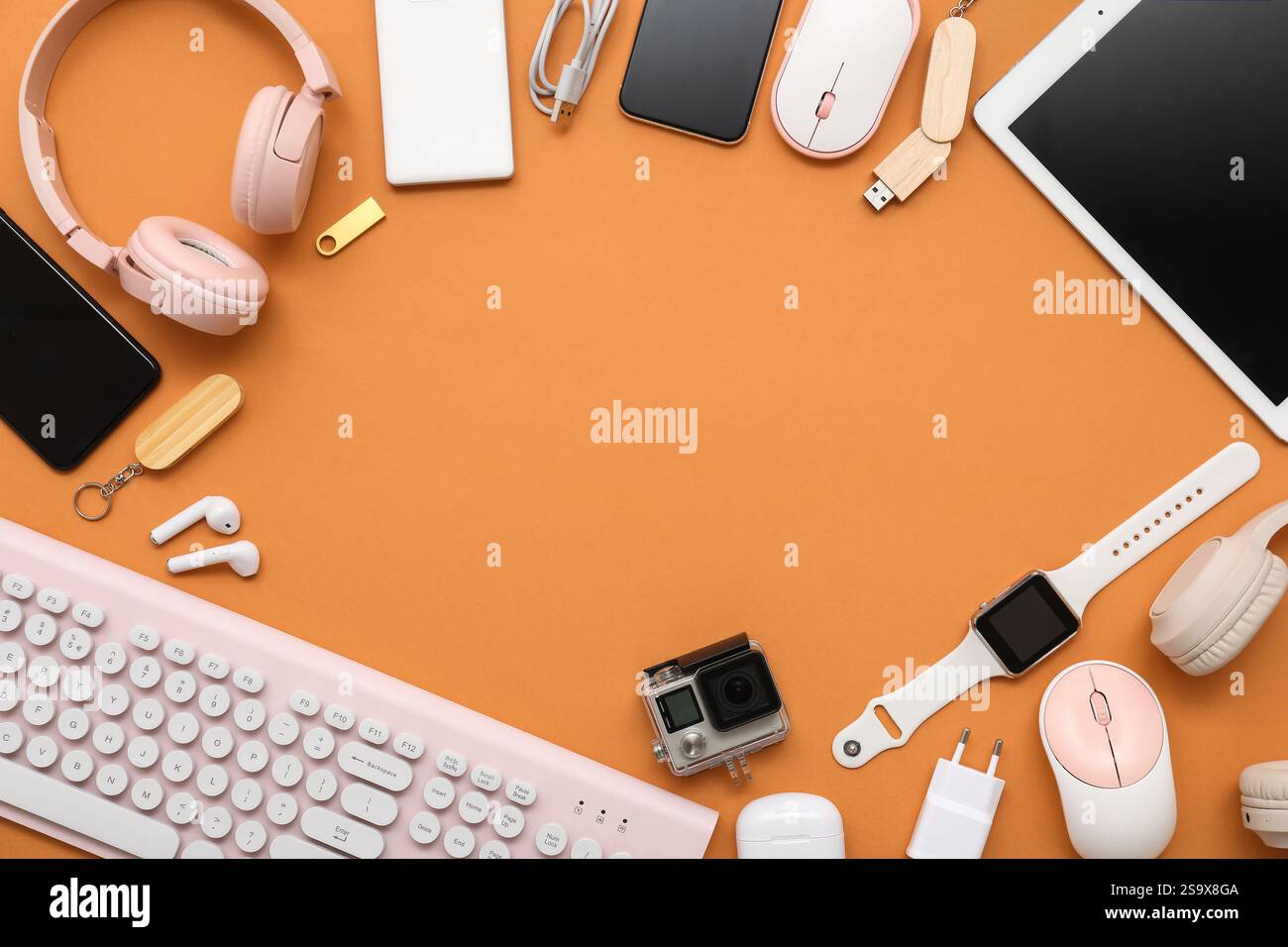 Frame made of different modern gadgets on color background Stock Photo ...