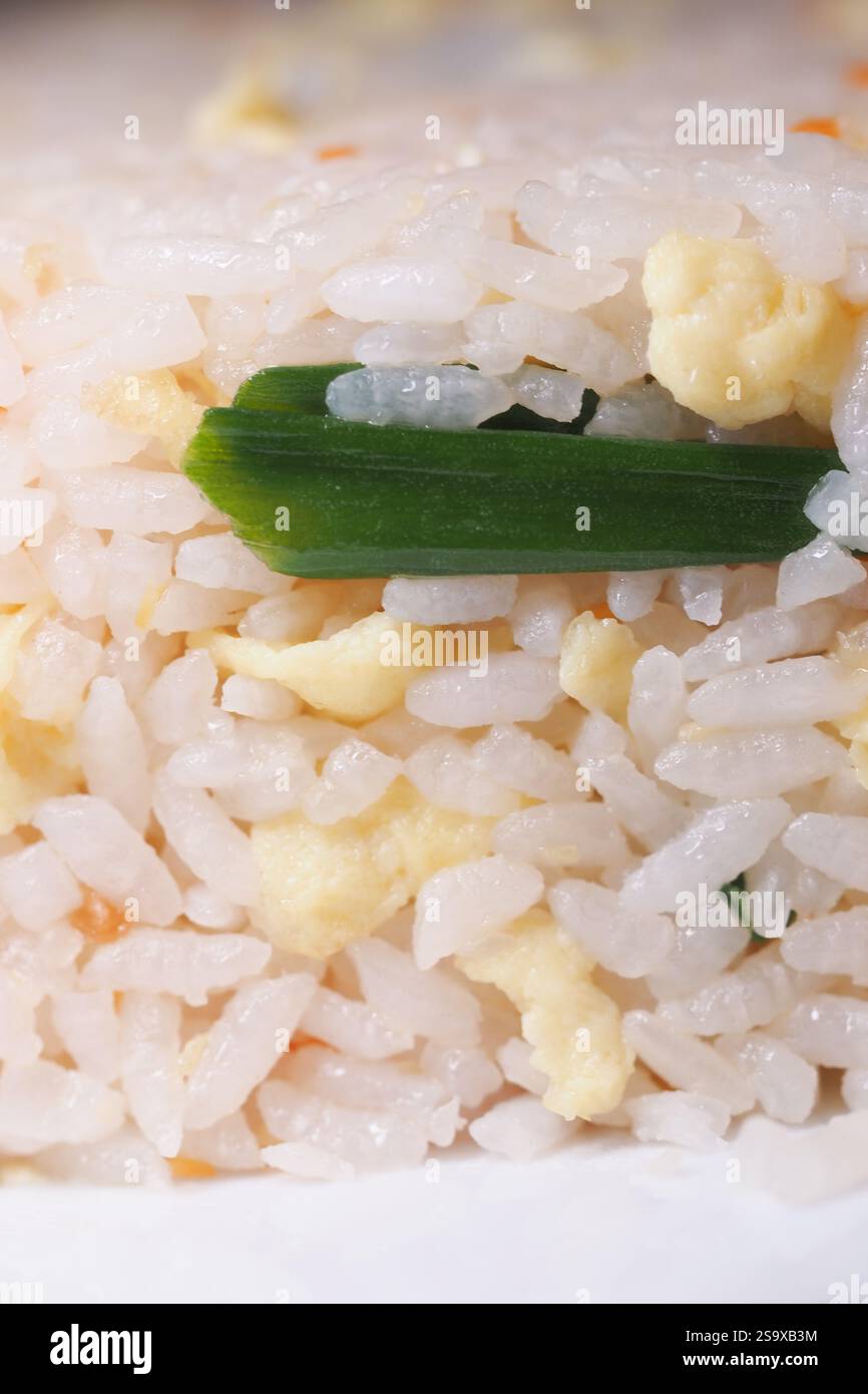 Savory fried rice with vegetables and egg on display Stock Photo - Alamy