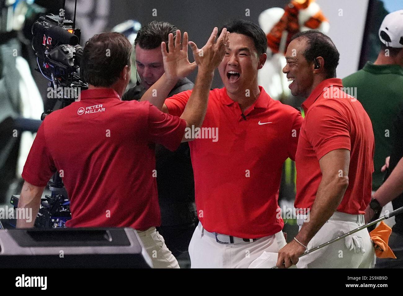 Jupiter Links Golf Club players, from right, Tiger Woods, Tom Kim, and ...