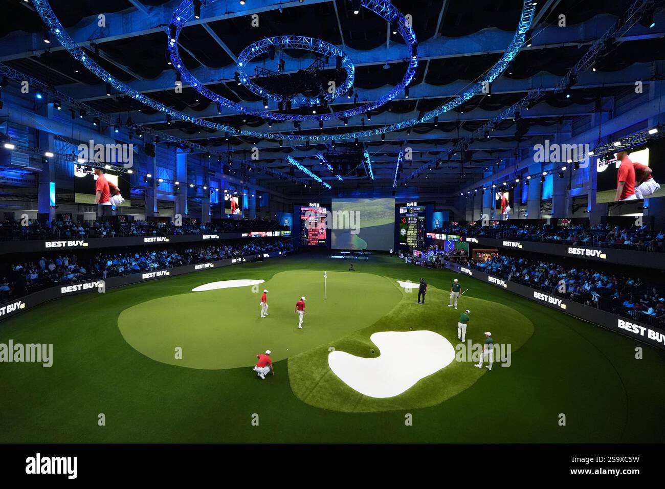 Fans watch play during a match of the TMRW Golf League (TGL) between ...