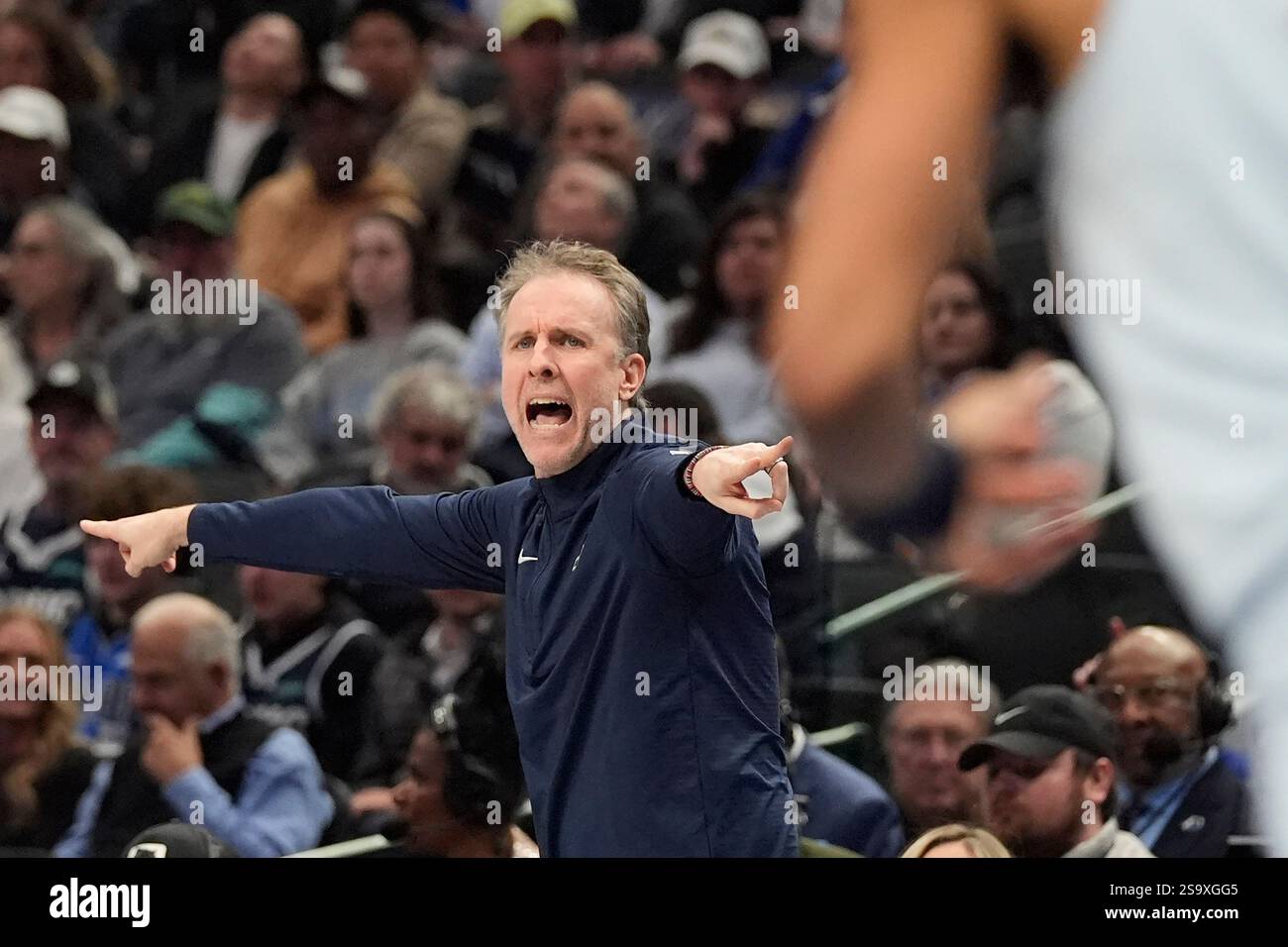Washington Wizards head coach Brian Keefe yells from the sidelines ...