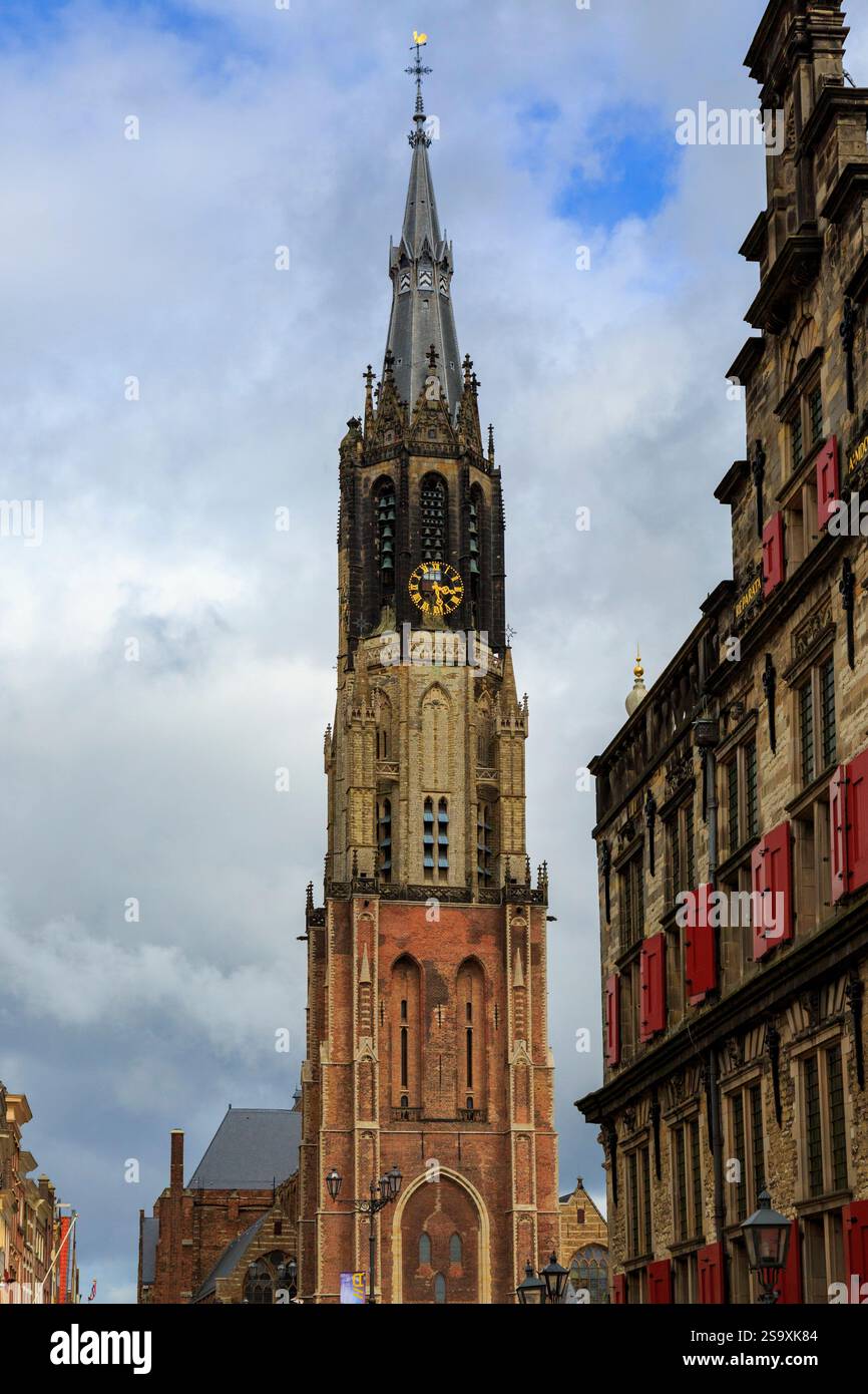 Netherlands, South Holland, Delft. Exterior steeple and clock tower of ...