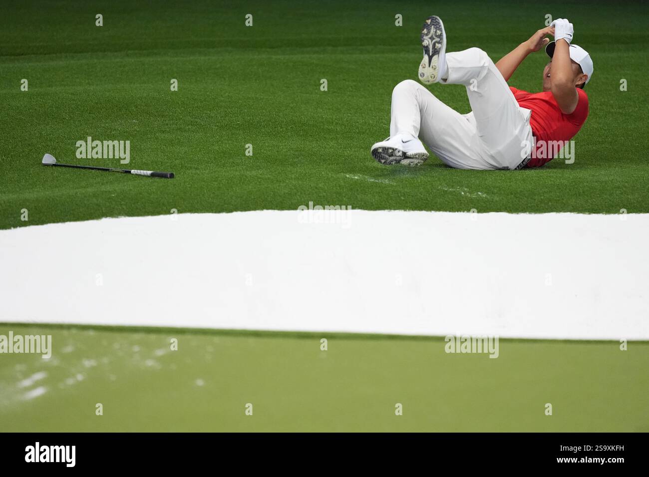 Tom Kim of Jupiter Links Golf Club rolls on the green as he celebrates ...