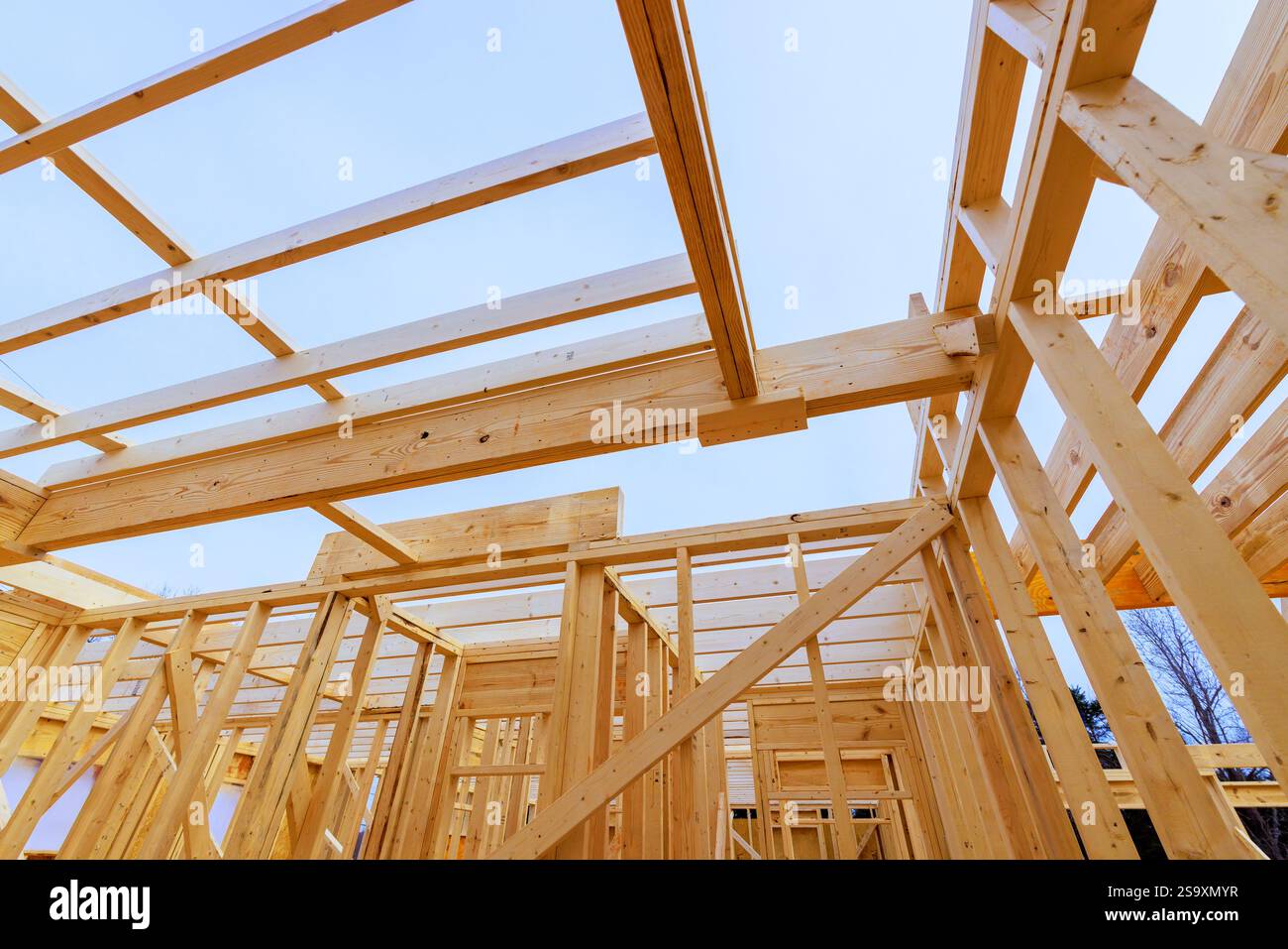 Constructing wooden frame structure with beams trusses in residential ...