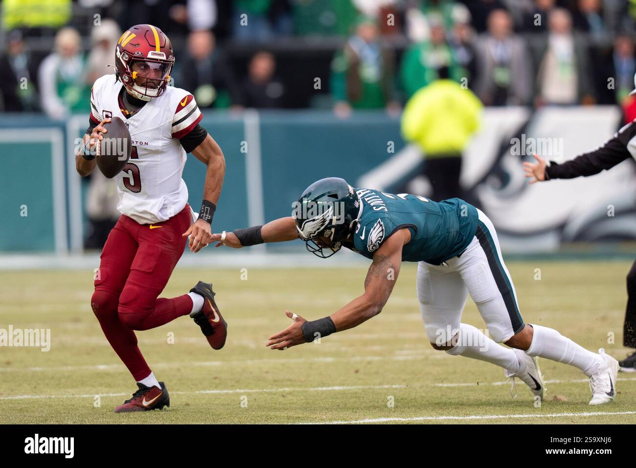 Washington Commanders quarterback Jayden Daniels (5) in action against Philadelphia Eagles ...