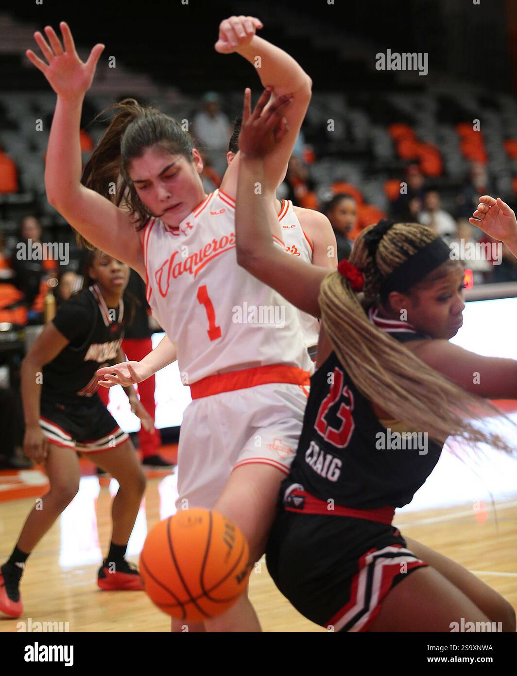 Texas Rio Grande Valley's Charlotte O'Keefe (1) fights for a rebound ...