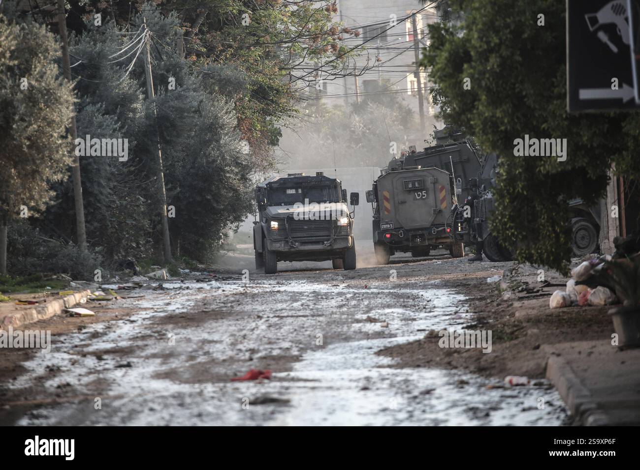Jenin, Palestine. 27th Jan, 2025. Israeli military vehicles patrol the ...
