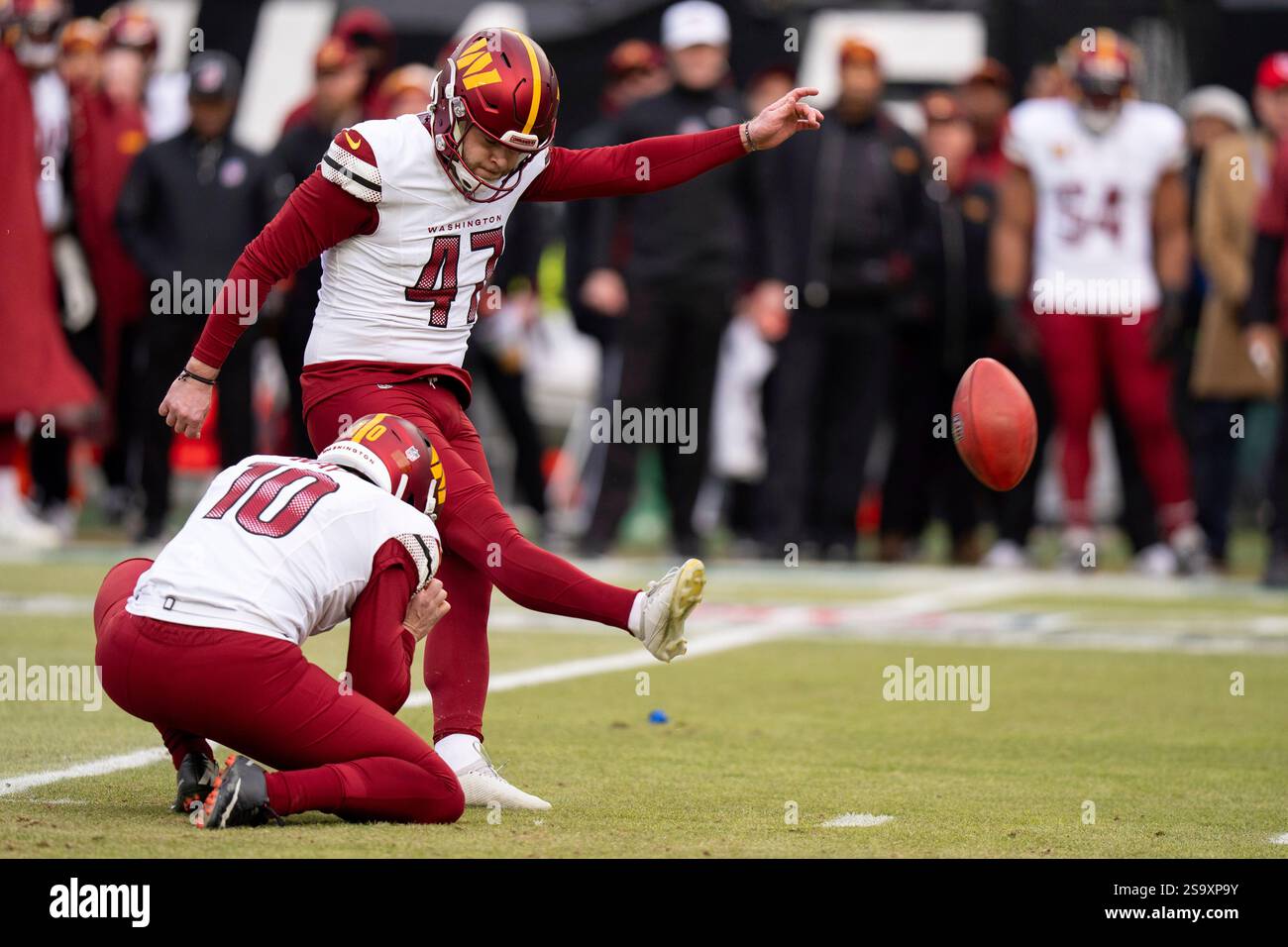 Washington Commanders kicker Zane Gonzalez (47) kicks the field goal ...