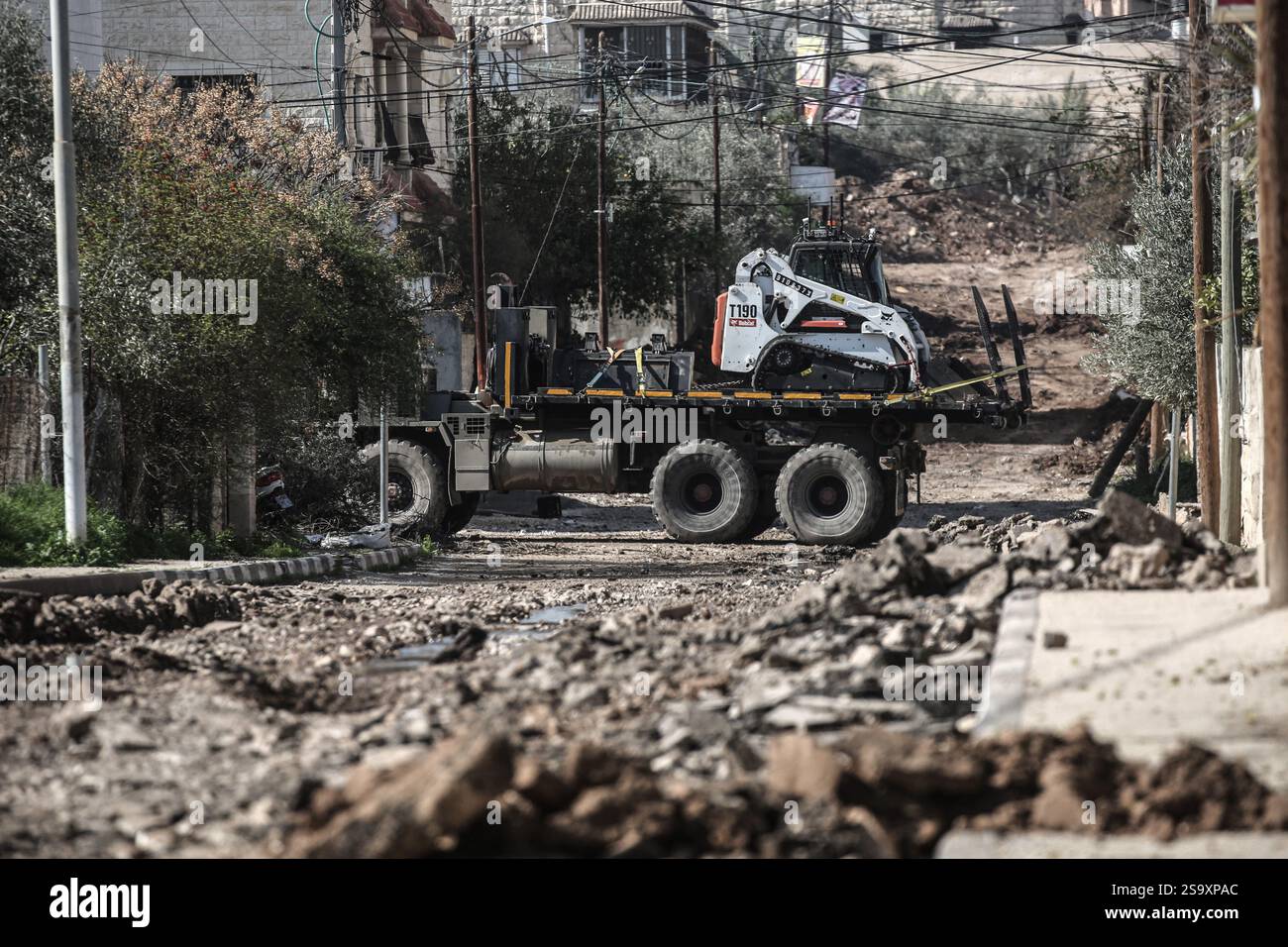 Jenin, Palestine. 27th Jan, 2025. Israeli military vehicles patrol the ...