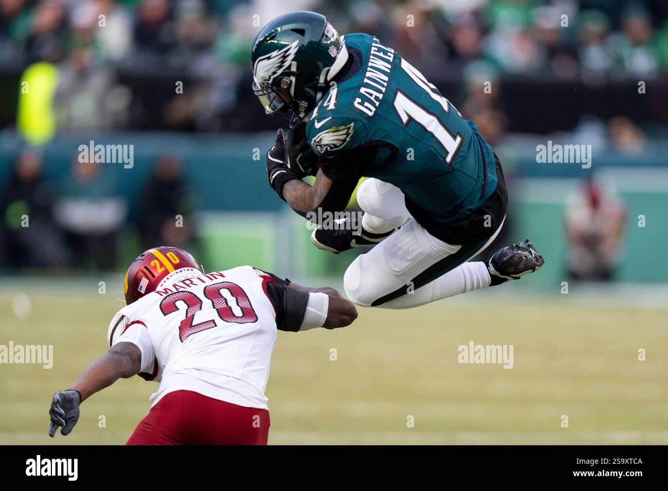 Philadelphia Eagles running back Kenneth Gainwell (14) leaps over ...