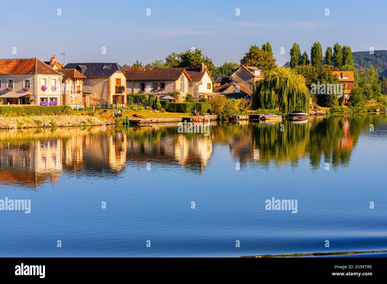 Beachfront homes situated on the Seine River in Normandy Stock Photo ...