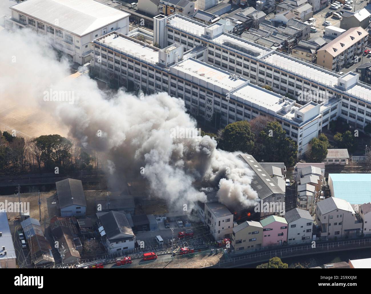 An aerial photo shows a fire scene at a warehouse area in Osaka City ...