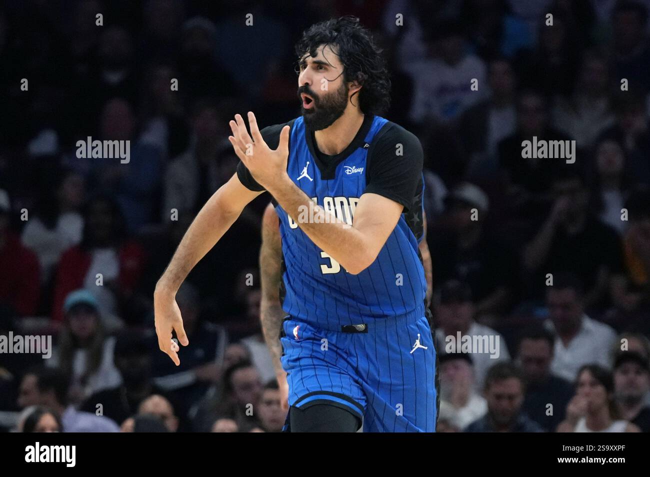 Orlando Magic center Goga Bitadze reacts after scoring during the ...