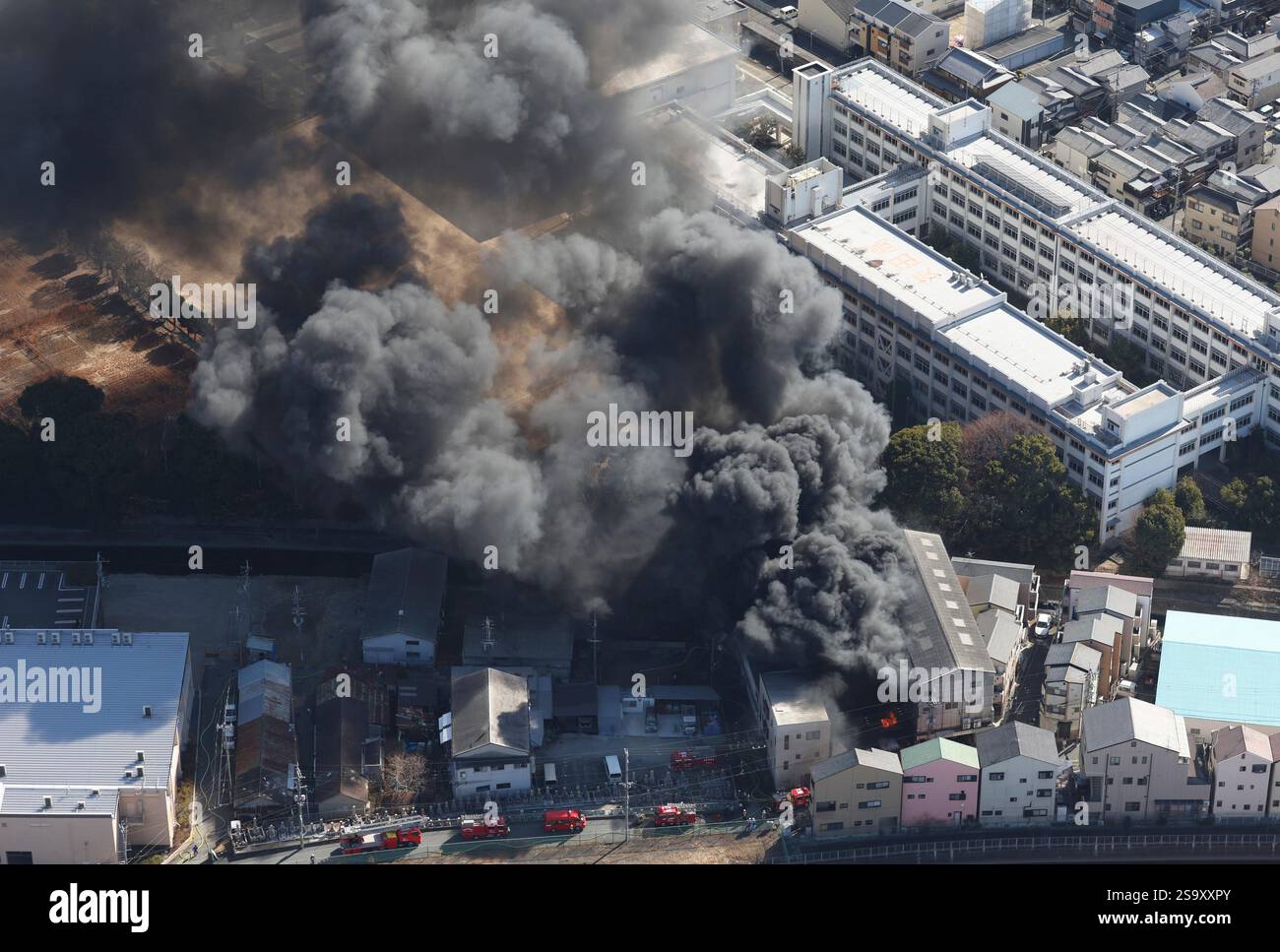 An aerial photo shows a fire scene at a warehouse area in Osaka City ...