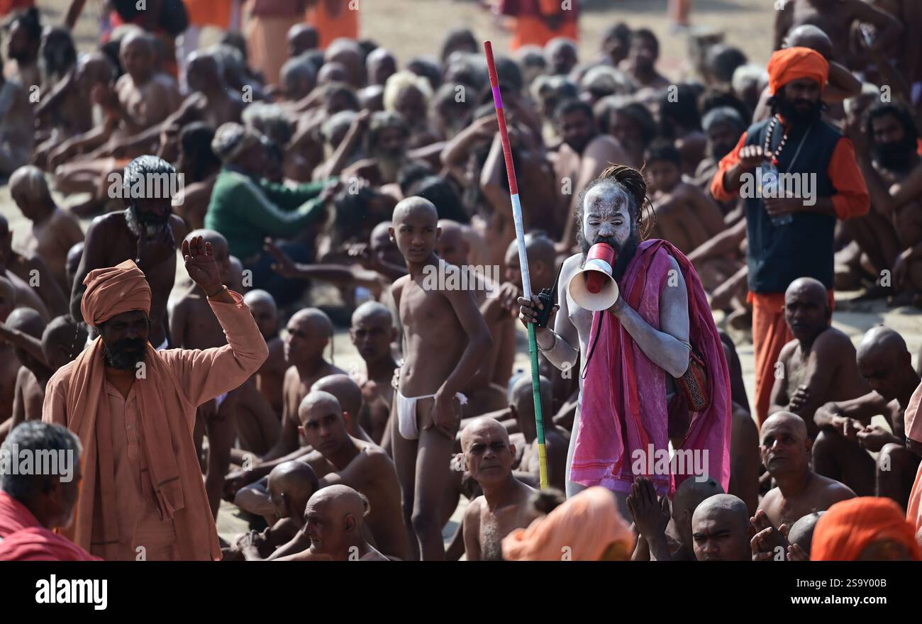 PRAYAGRAJ, INDIA - JANUARY 27: Hindu holy men take part in the ...