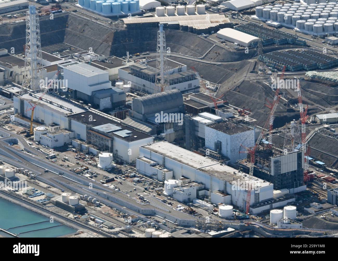 An aerial photo shows the Fukushima Daiichi Nuclear Power Station which a work is underway to ...