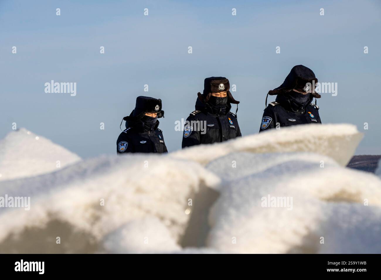 Border police patrol the Huma section of the China-Russia border River ...