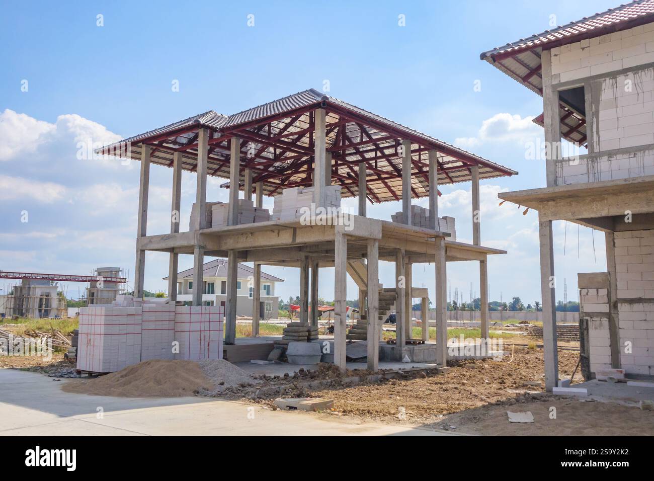 construction residential new house in progress at building site housing ...