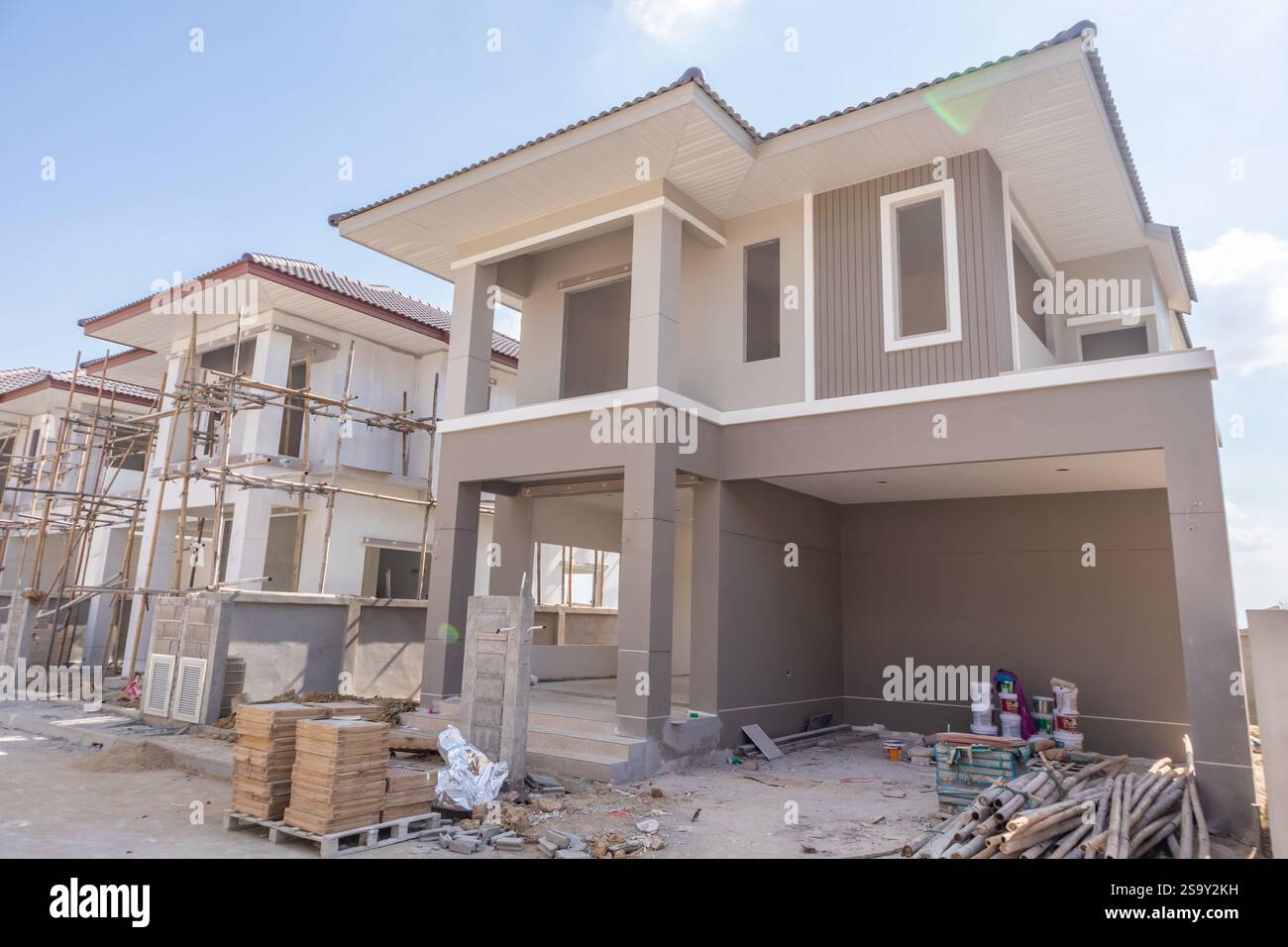 construction residential new house in progress at building site housing ...