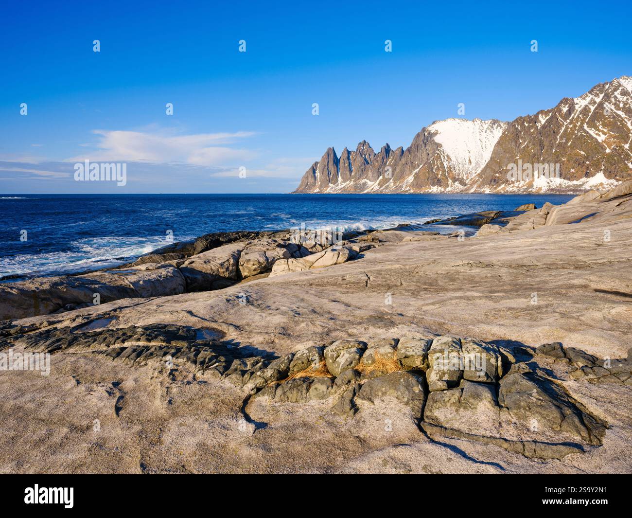 Coastal landscape at Tungeneset and the peaks Okshornan (Devils Teeth ...