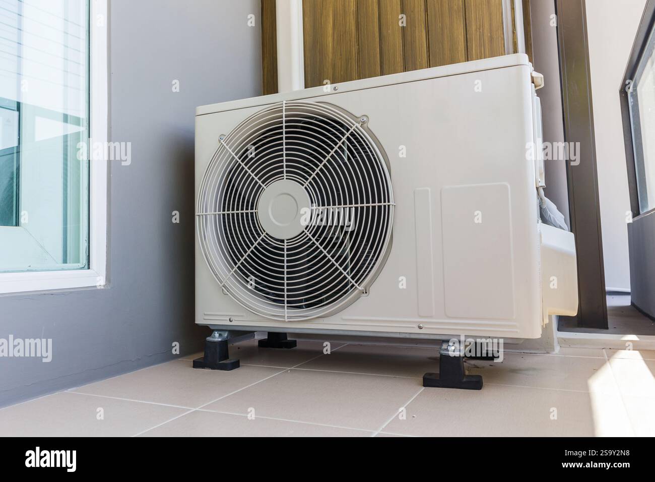 Air condition outdoor unit compressor install outside the house Stock ...