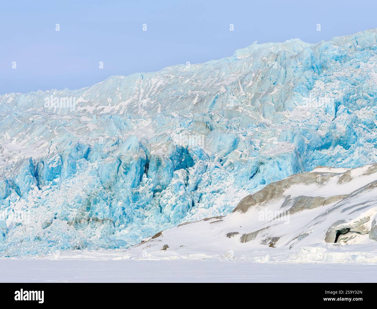 Glacier Nordenskioldbreen and frozen Adolfbukta. Winter landscape on ...