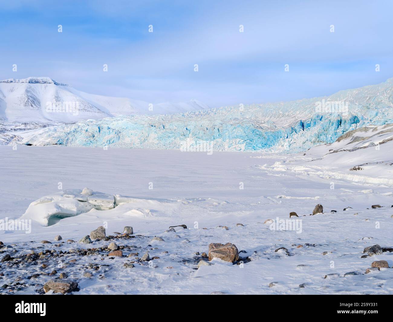 Glacier Nordenskioldbreen and frozen Adolfbukta. Winter landscape on ...