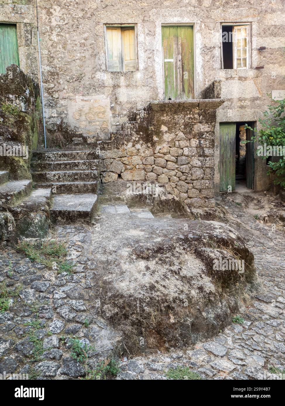 Ancient Portuguese village built on the side of a mountain between ...