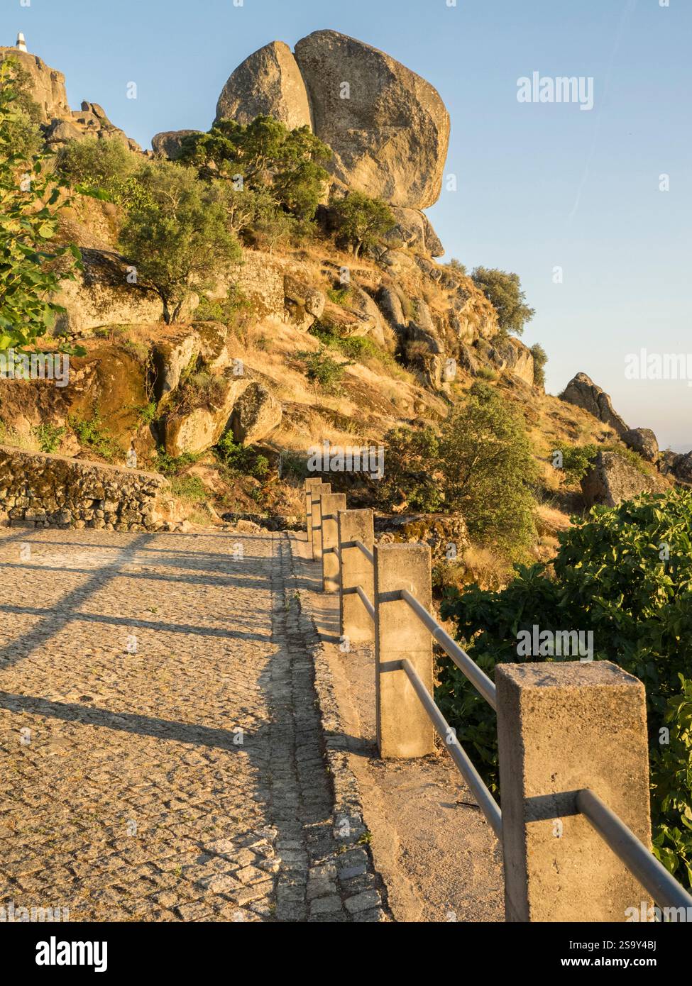 Paved lookout with large boulders above in the ancient, medieval ...