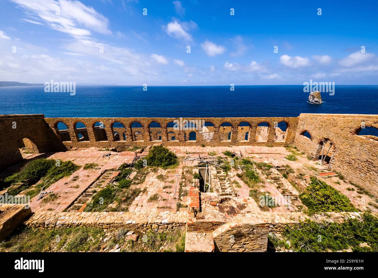 Ruined factory walls of Laveria Lamarmora, a former processing plant ...