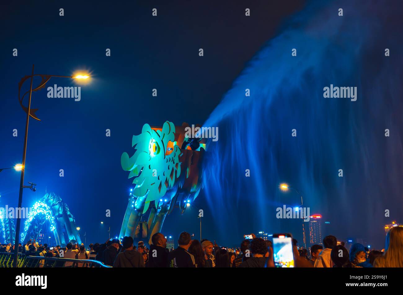 Water show at Dragon Bridge, the famous bridge in Da Nang at night. Da ...