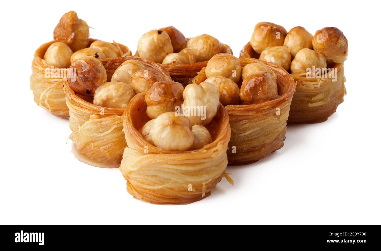 Sweet pastry filled with crunchy nuts ready to be enjoyed at a local ...