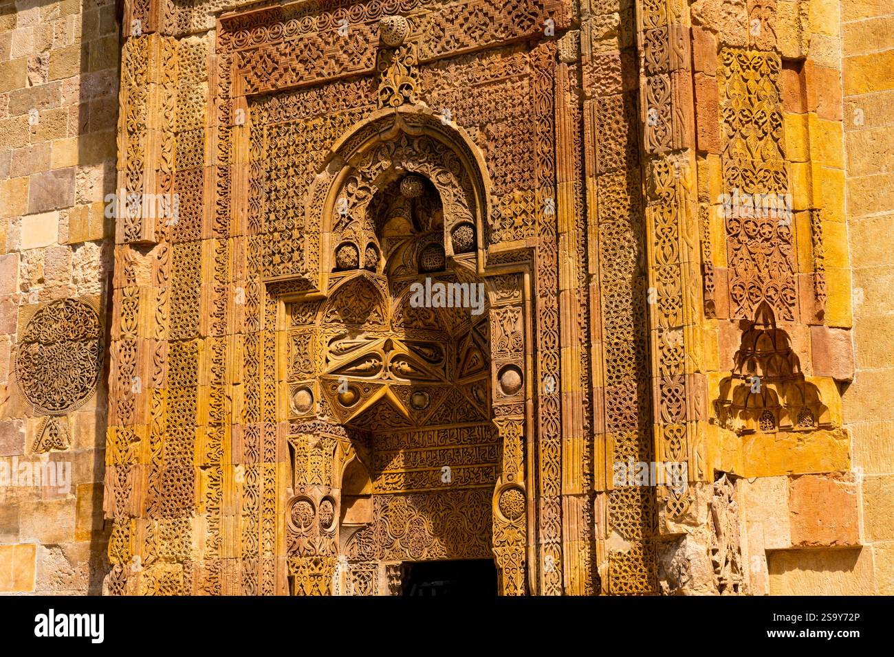 Shadow of a praying man on the gate of Great Mosque of Divrigi aka ...