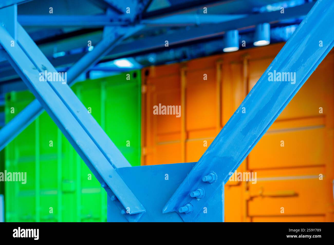 View of warehouse building with various colorful rafters (roof beams ...