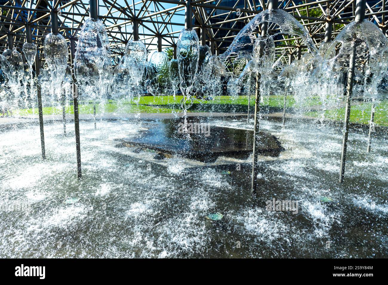 Water sprays downward from the Coles fountain in Parliament Gardens ...