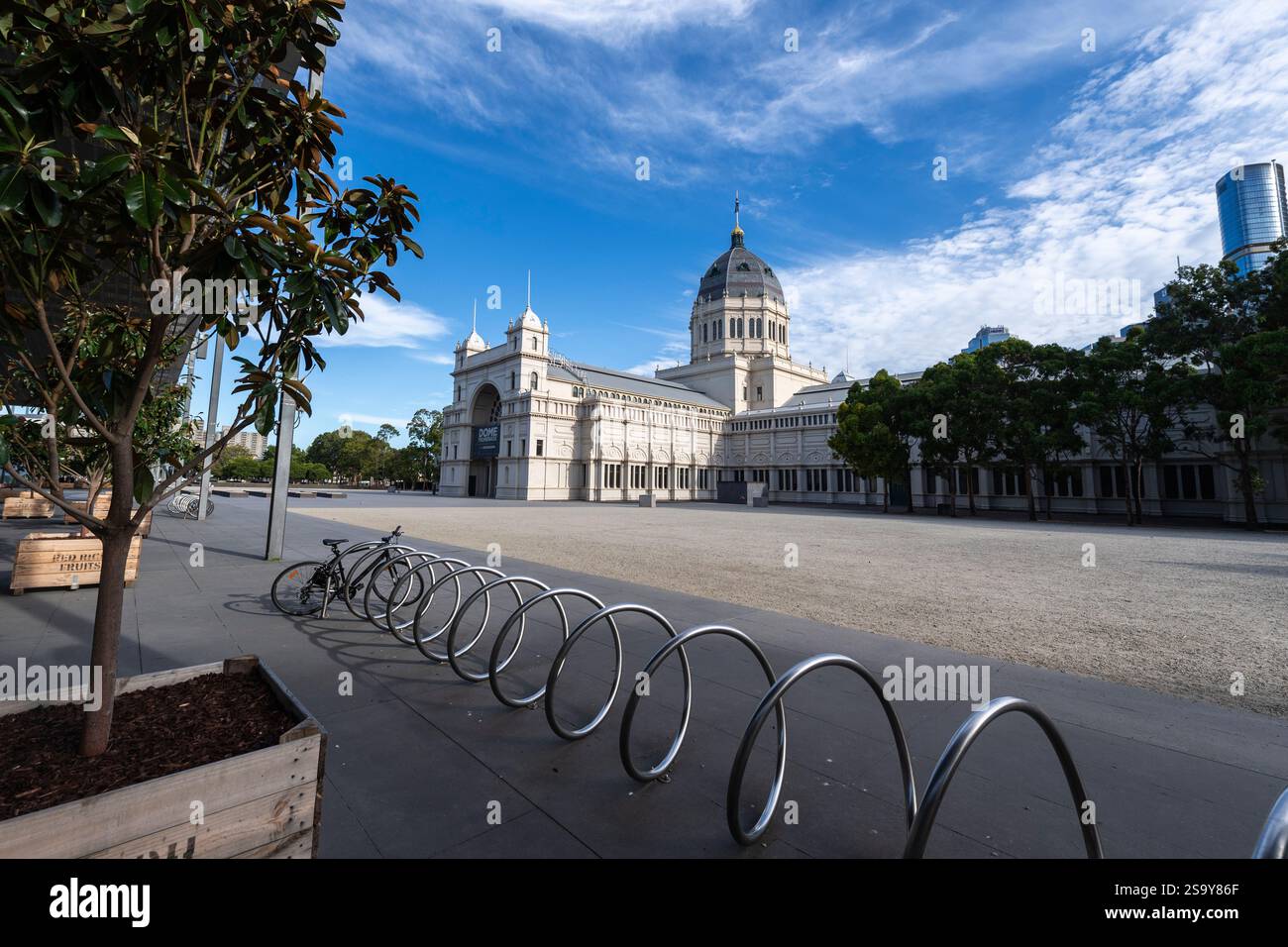 A spiral bike rack leads to the white stone exterior of the Royal ...