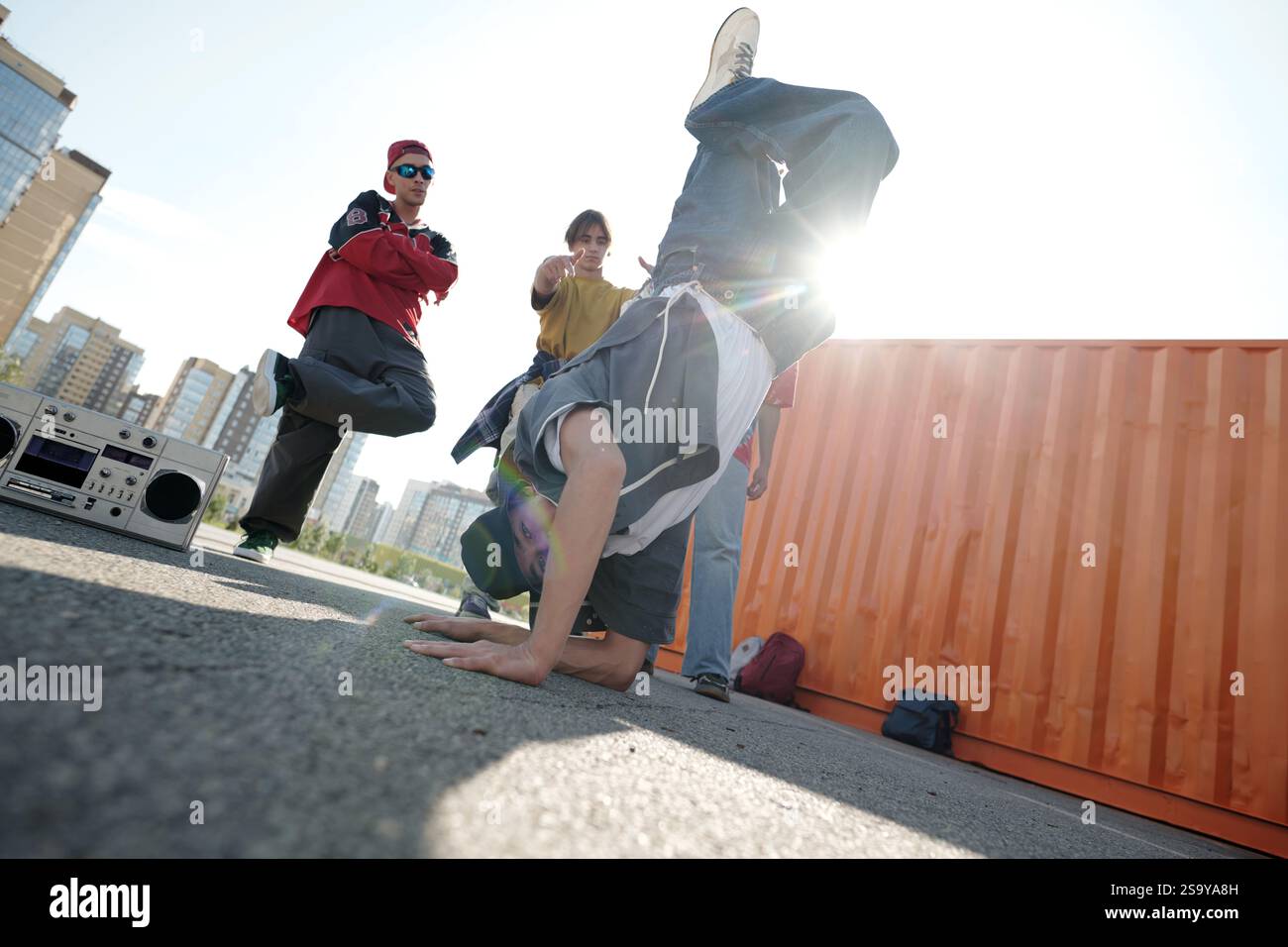 Practicing Breakdancing Moves on Urban Rooftop Setting Stock Photo - Alamy