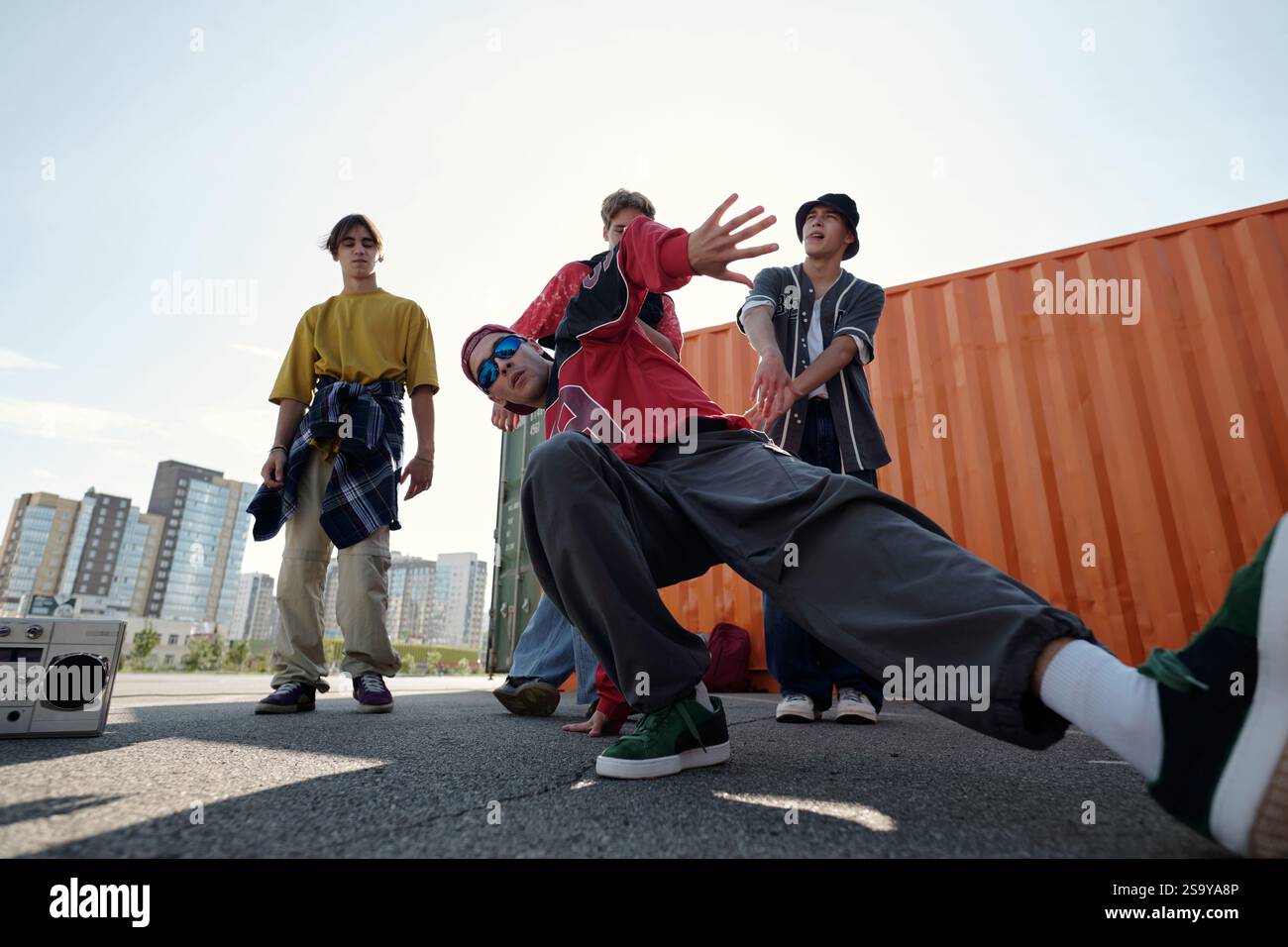 Performing Hip-Hop Dance Moves on Urban Rooftop Stock Photo - Alamy