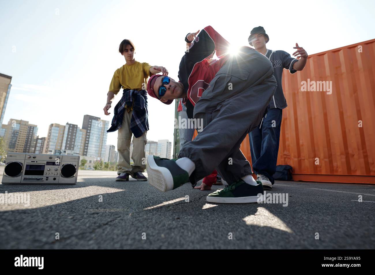Breakdancing Group Performing in Urban Setting Stock Photo - Alamy